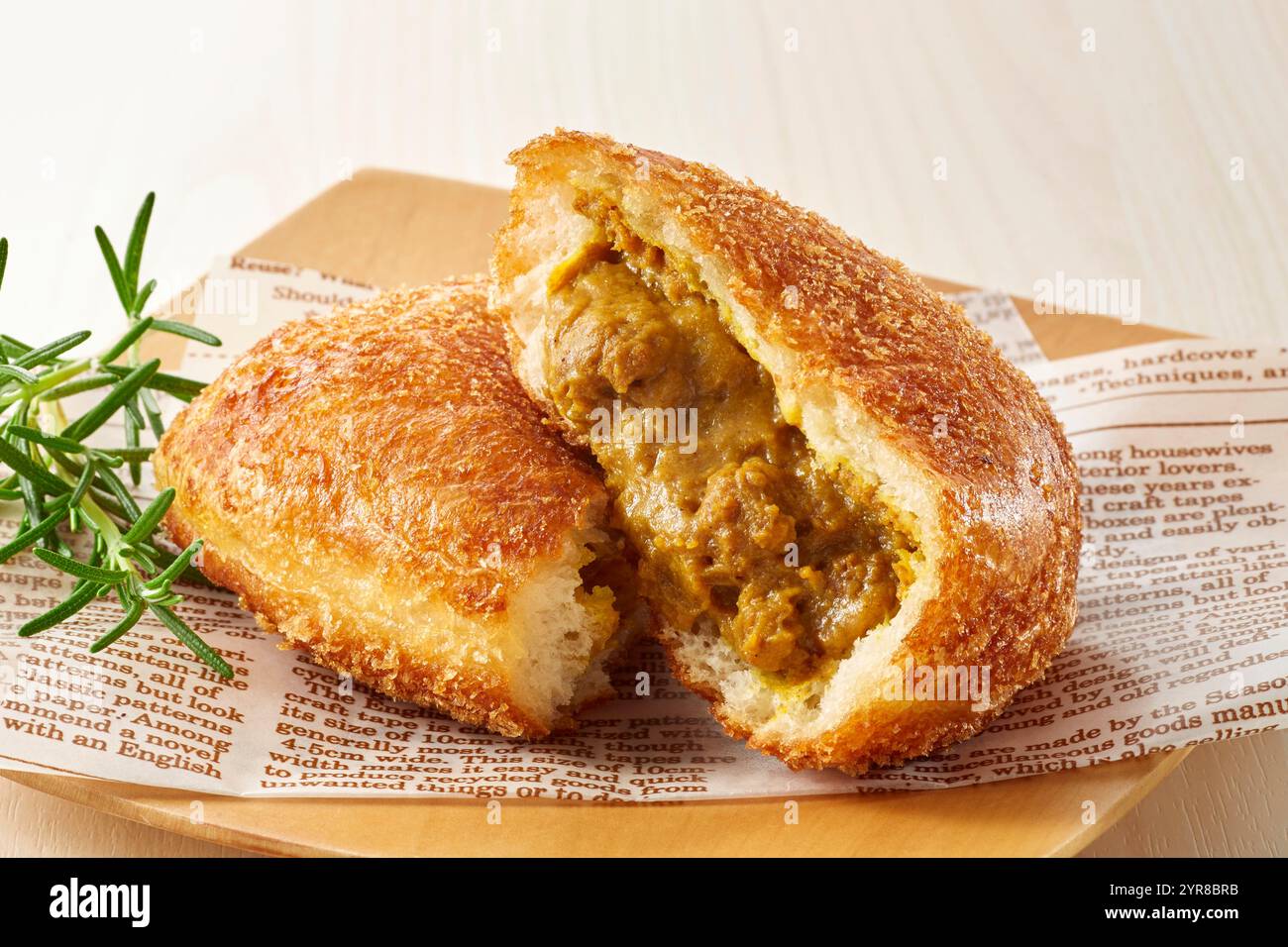 Bread on wooden plate hi-res stock photography and images - Alamy