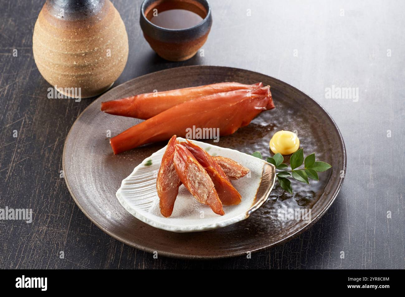 Smoked chicken and sake Stock Photo - Alamy