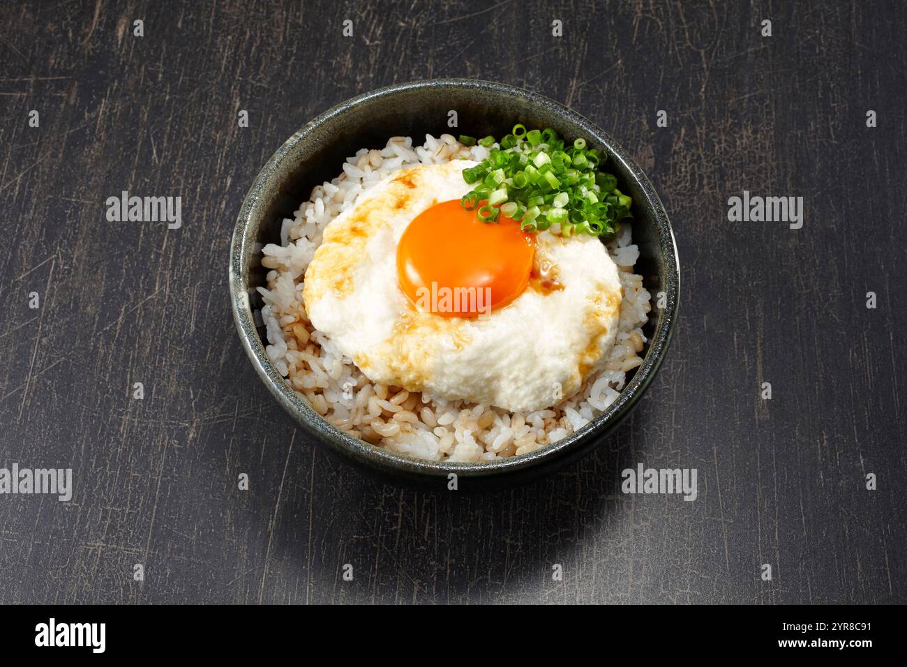 Mugi toro donburi with soy sauce Stock Photo - Alamy