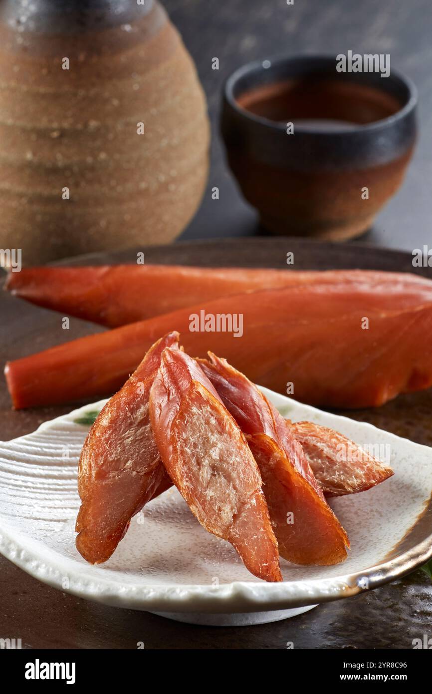 Smoked chicken and sake Stock Photo - Alamy