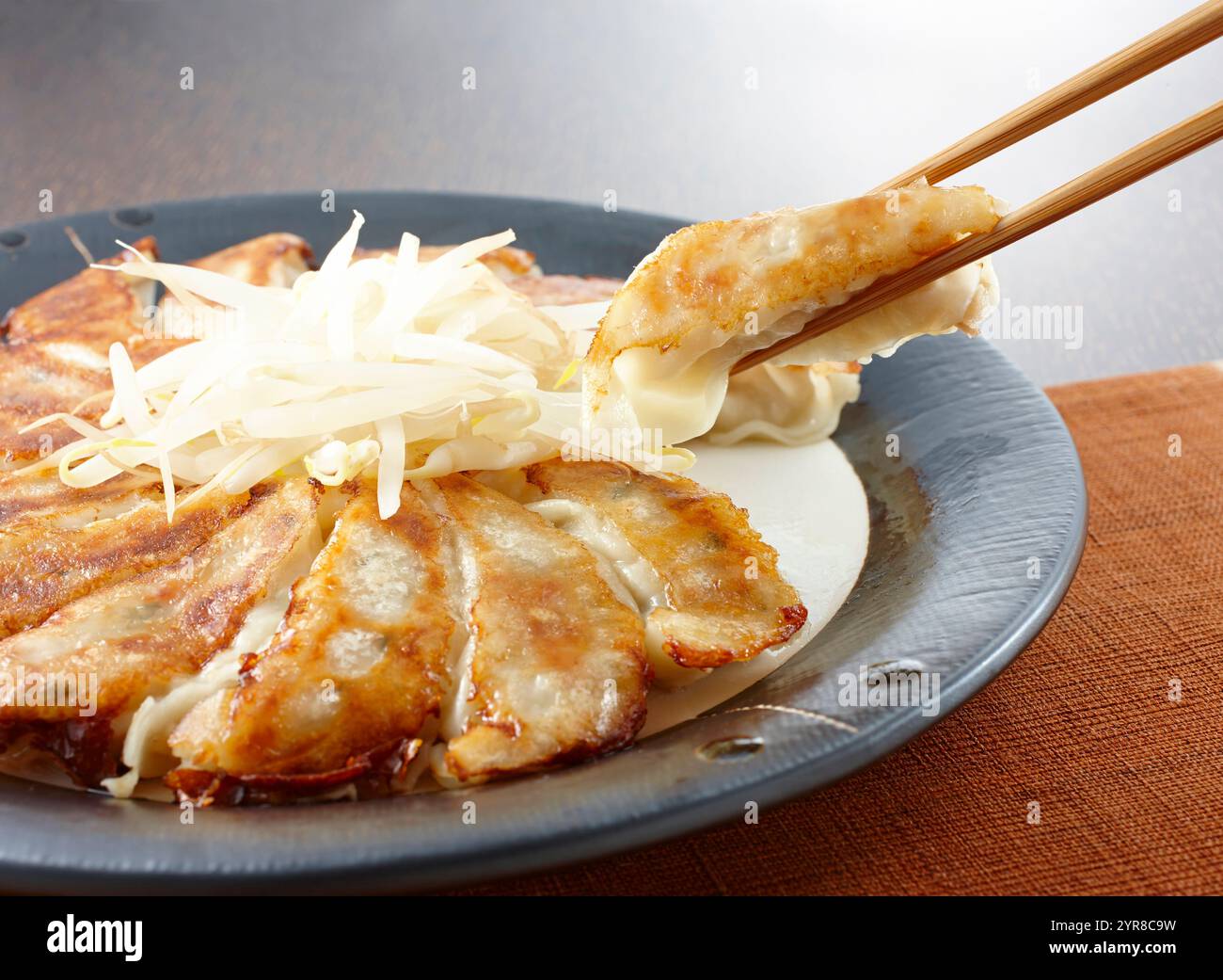 Eating gyoza hi-res stock photography and images - Alamy