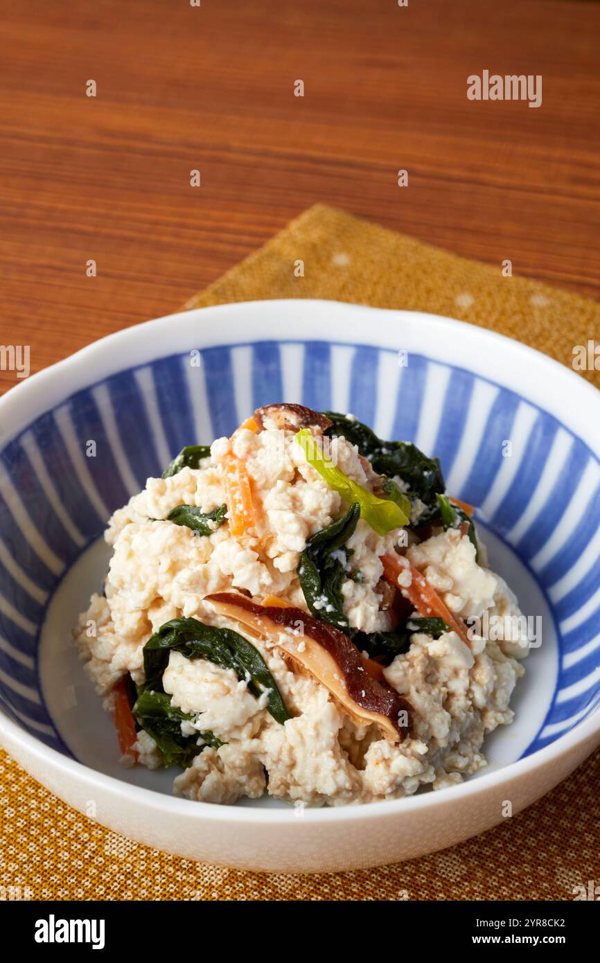 Tofu paste with spinach and other vegetables Stock Photo - Alamy