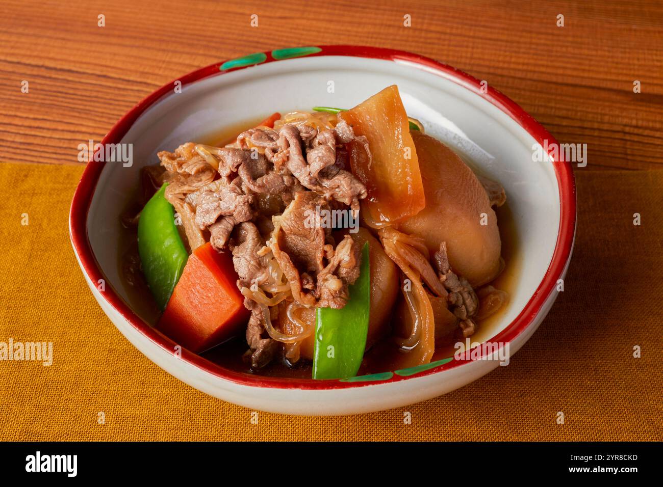 Nikujaga, Potatoes and Meat Simmered in Sweetened Soy Sauce Stock Photo ...