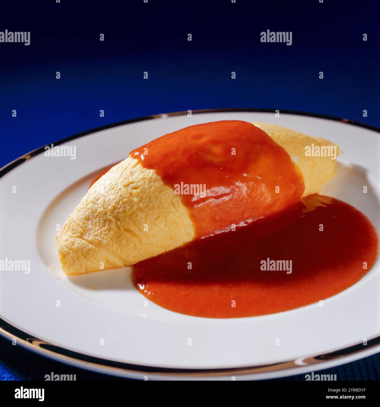 omelet rice with demi-glace sauce Stock Photo - Alamy