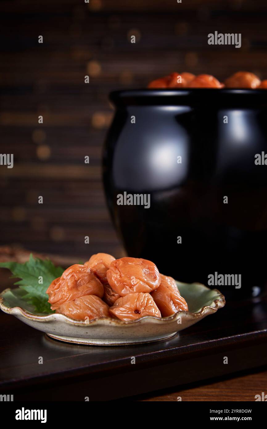 Umeboshi in a jar (pickled plums Stock Photo - Alamy