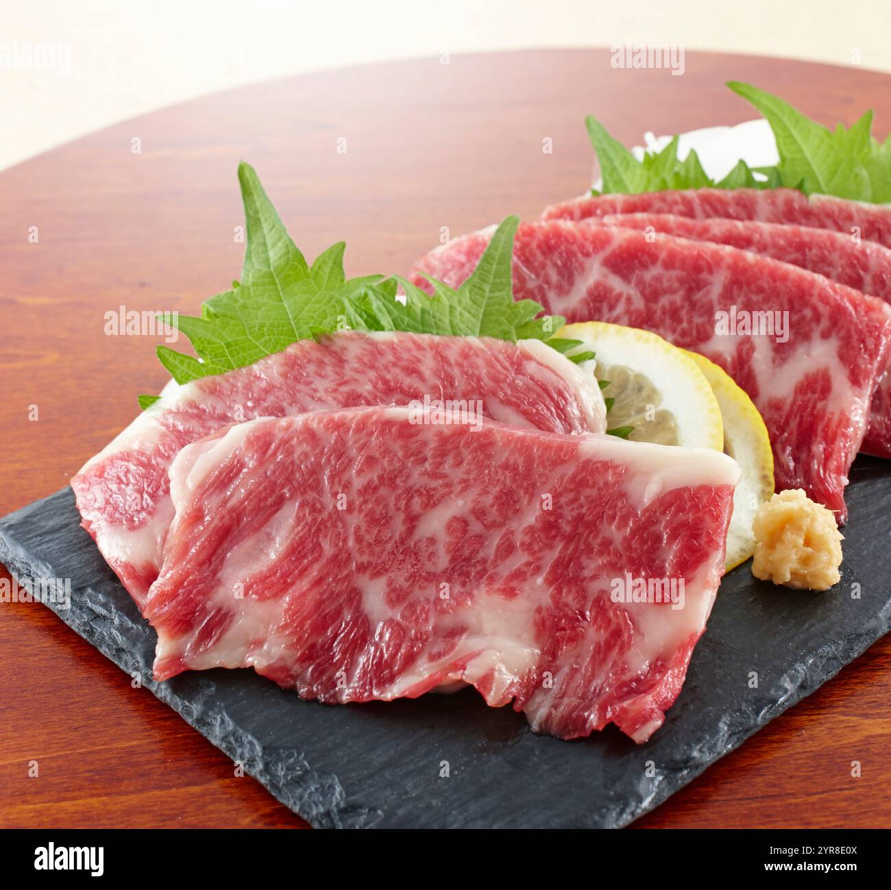 Marbled horse-meat sashimi Stock Photo - Alamy
