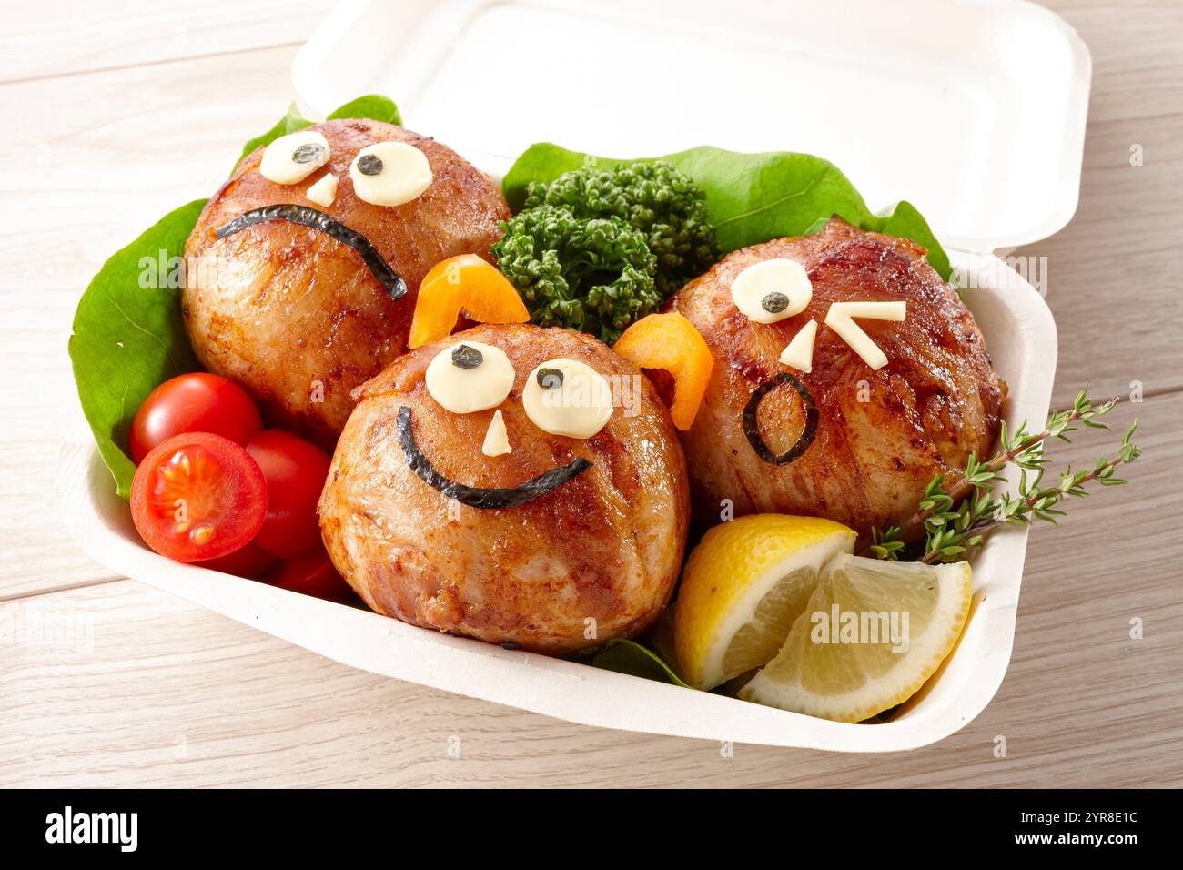 Three brothers meat-rolled rice balls Stock Photo - Alamy