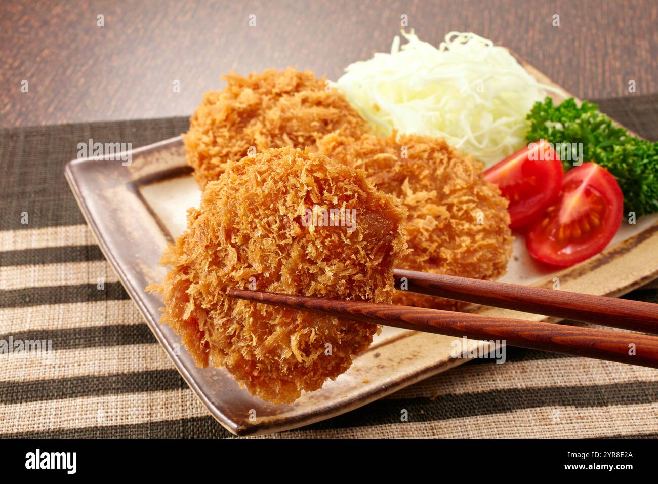 Bite-sized pork cutlet Stock Photo - Alamy