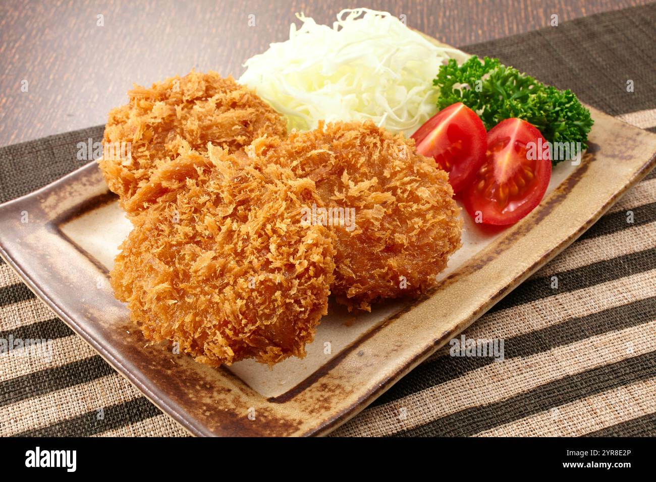 Bite-sized pork cutlet Stock Photo - Alamy