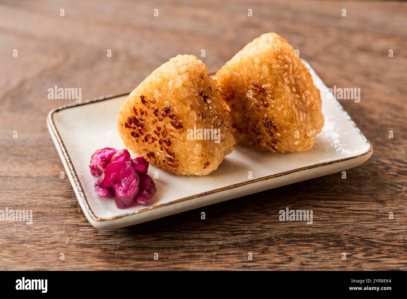 Grilled rice ball and pickles Stock Photo - Alamy