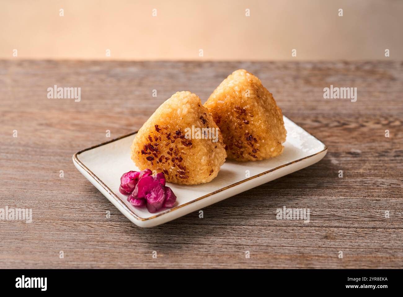 Grilled rice ball and pickles Stock Photo - Alamy