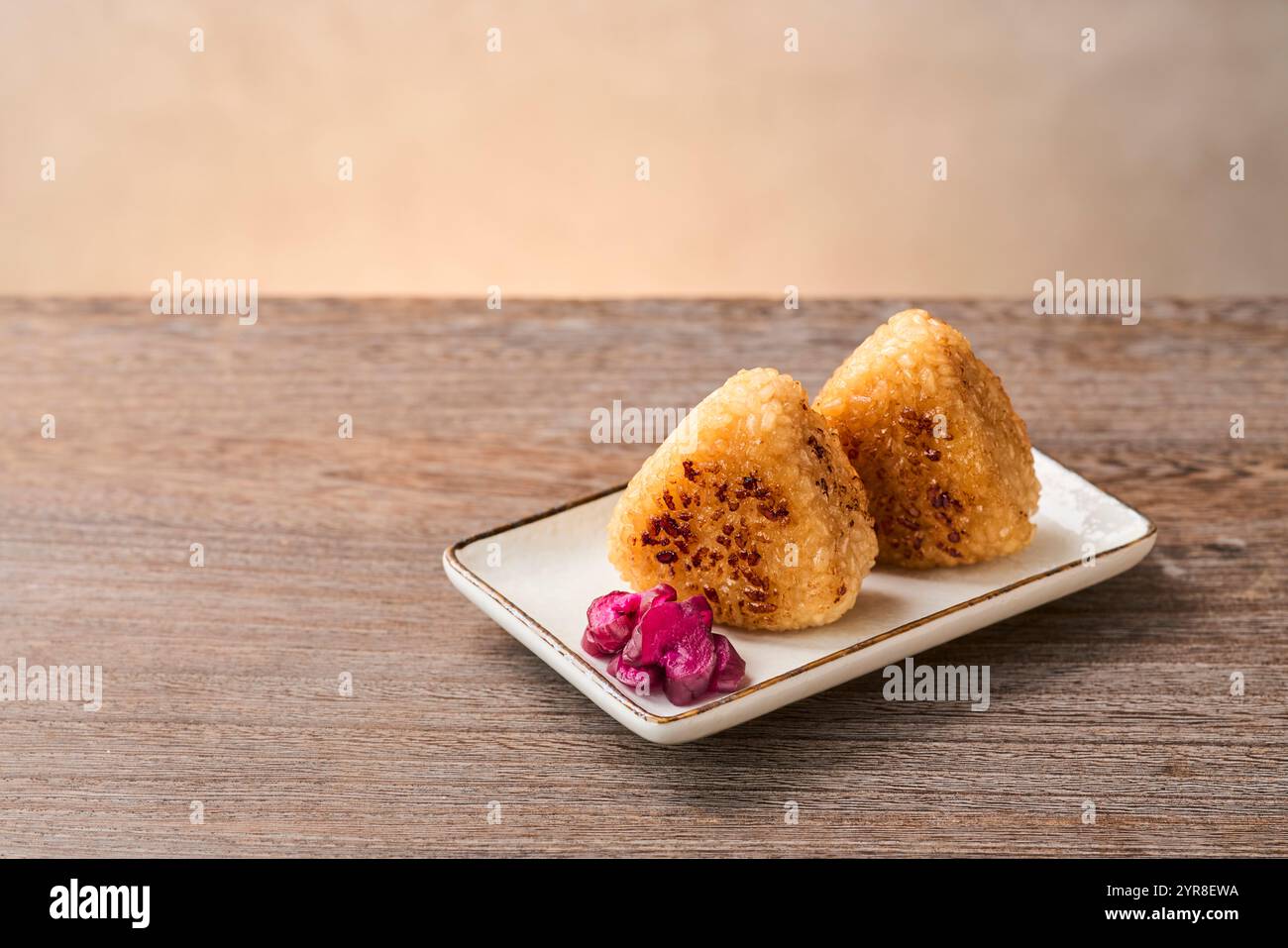 Grilled rice ball and pickles Stock Photo - Alamy