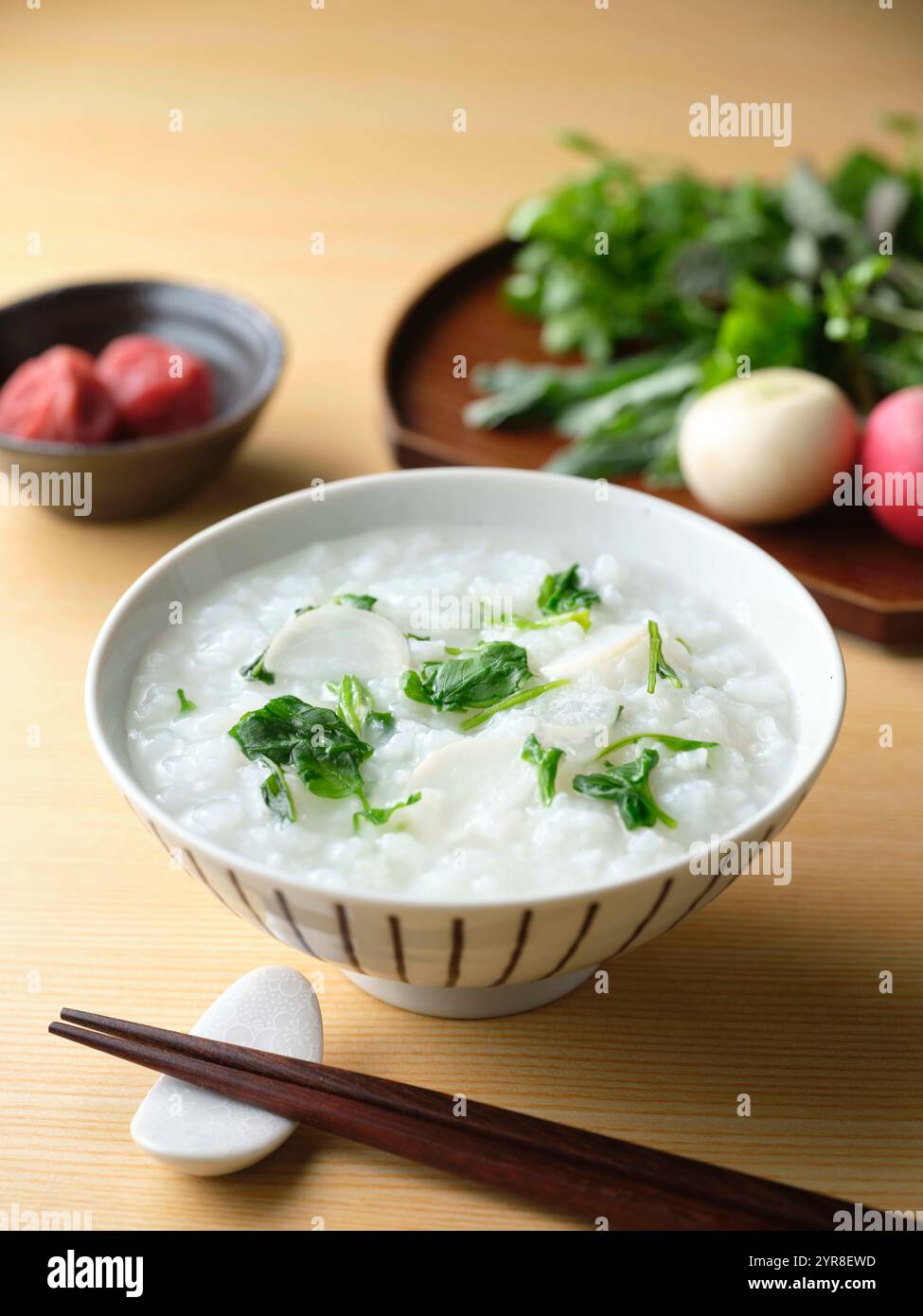 Rice gruel with seven herbs and pickled plums Stock Photo - Alamy