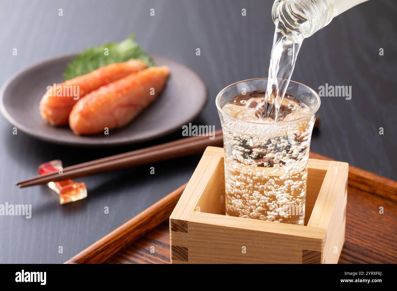 Cold sake and snacks Stock Photo - Alamy
