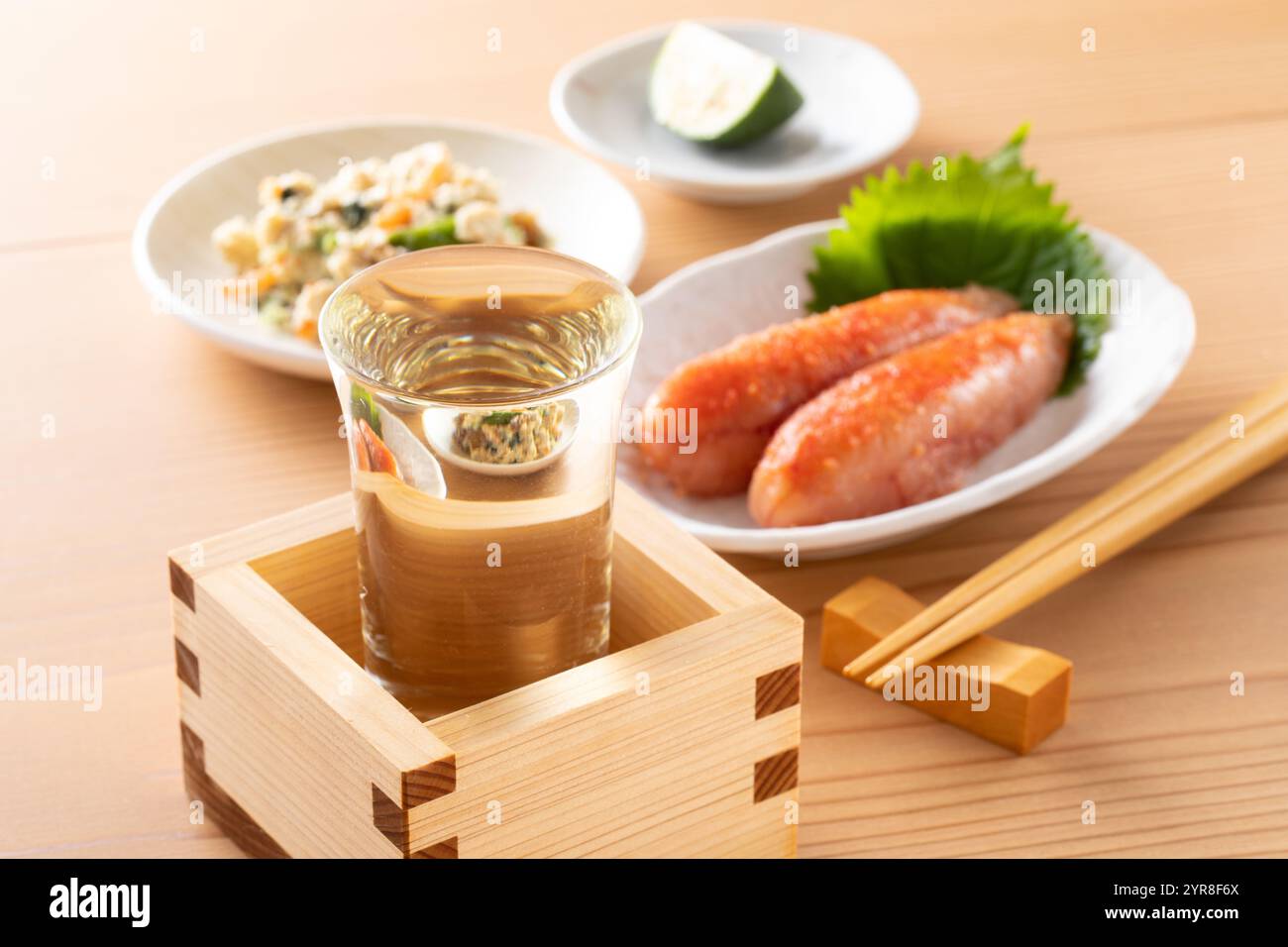 Cold sake and snacks Stock Photo - Alamy
