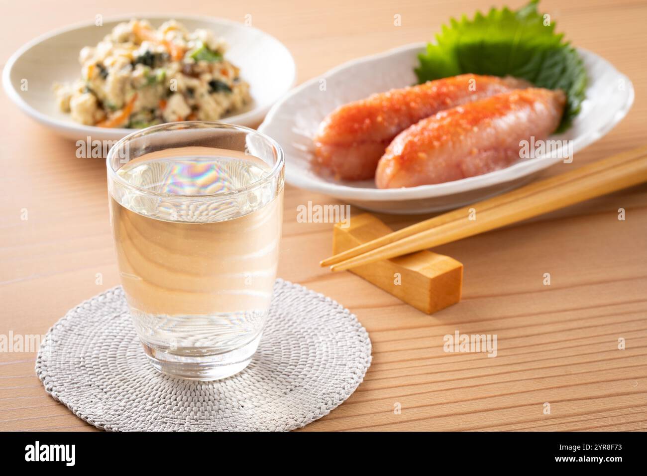 Cold sake and snacks Stock Photo - Alamy