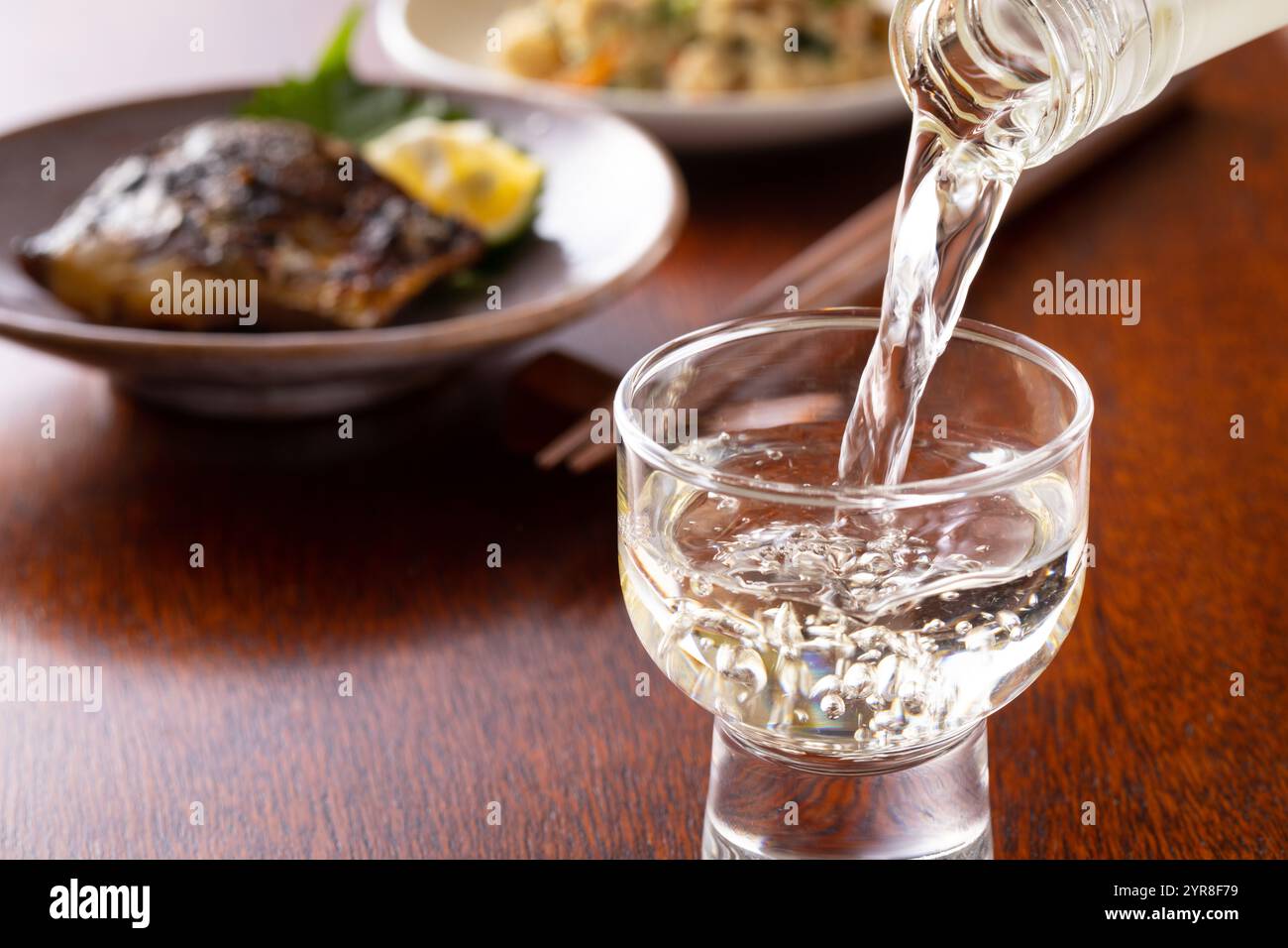 Cold sake and snacks Stock Photo - Alamy