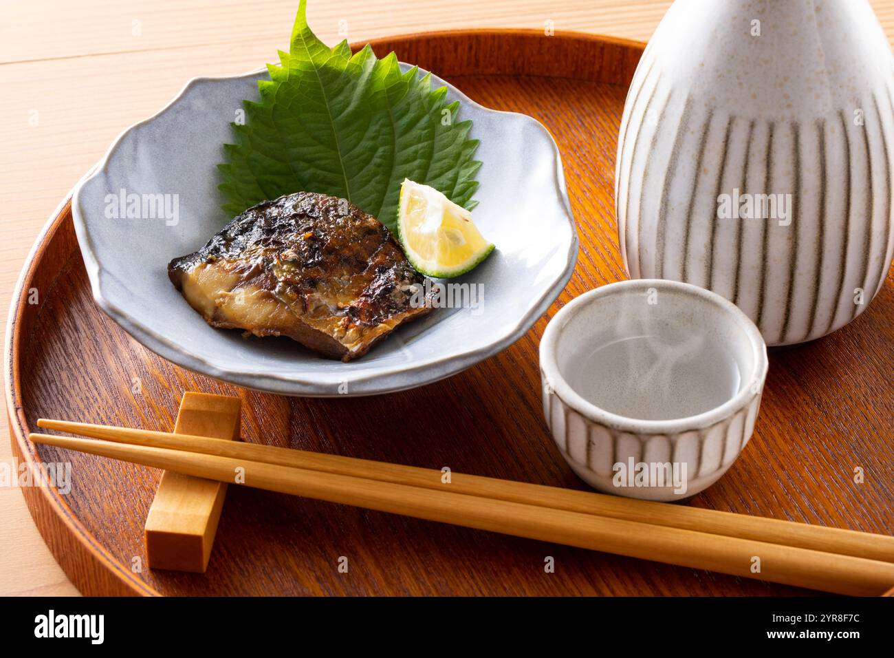 Sake and snacks Stock Photo - Alamy