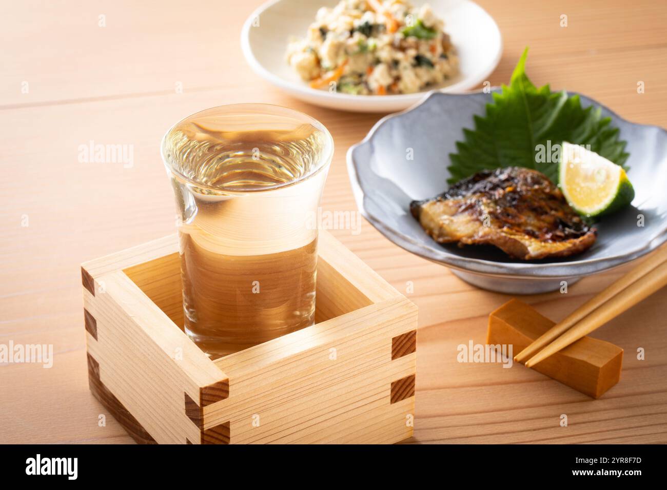 Cold sake and snacks Stock Photo - Alamy