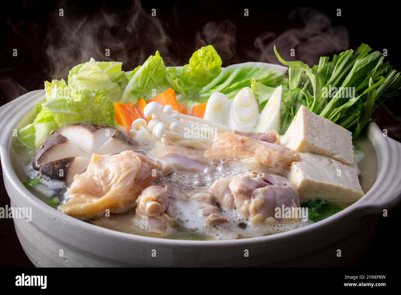 Chicken cooked in a pot Stock Photo - Alamy