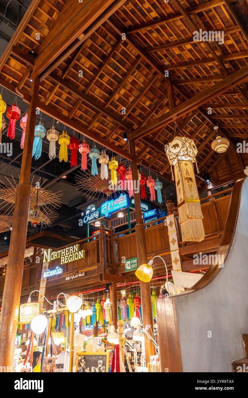 Vibrant market stalls under traditional wooden beams in a lively ...