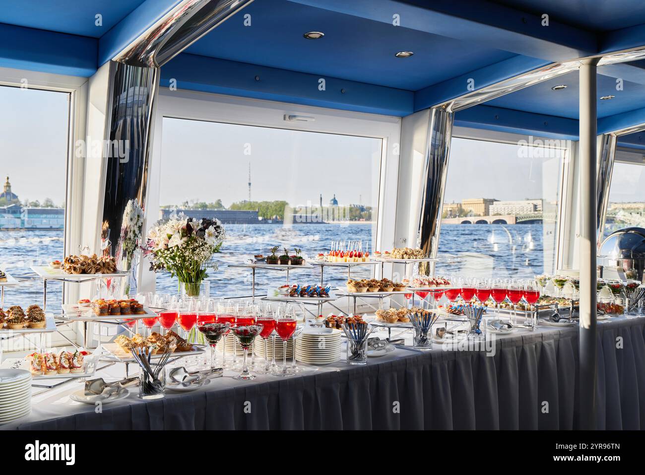 An Elegant Party Buffet featuring a Scenic Water View for a truly ...