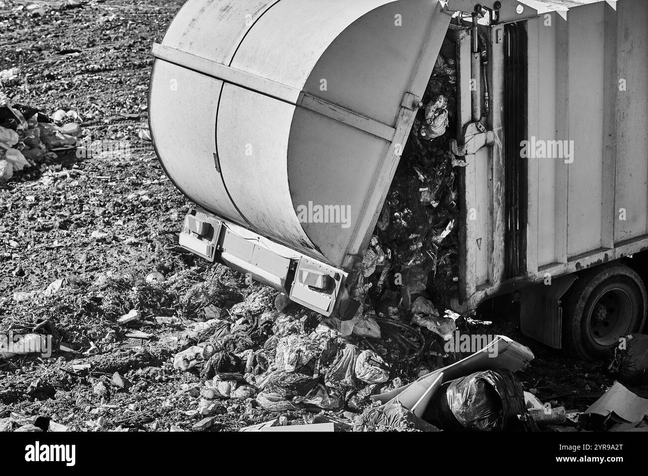 Truck unloading garbage on an open air dump. Waste recycling Stock ...