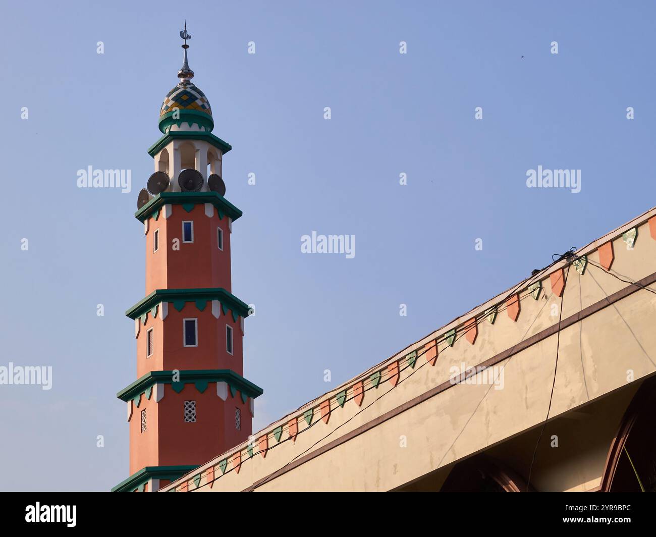 a towering mosque minaret with its dome in Middle Eastern architectural ...