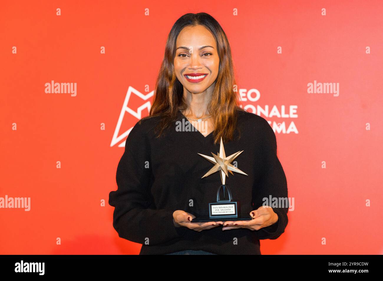 Turin, Italy. 3rd December 2024. Actress Zoe Saldana receives "Stella ...