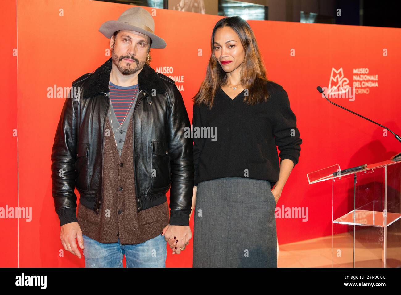 Turin, Italy. 3rd December 2024. Actress Zoe Saldana with husband film ...