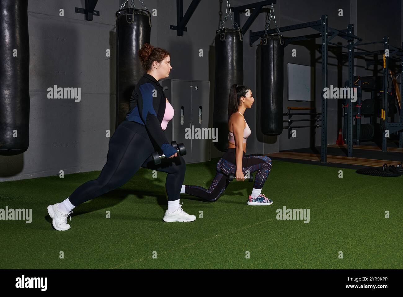 Focused athlete lunges hi-res stock photography and images - Alamy