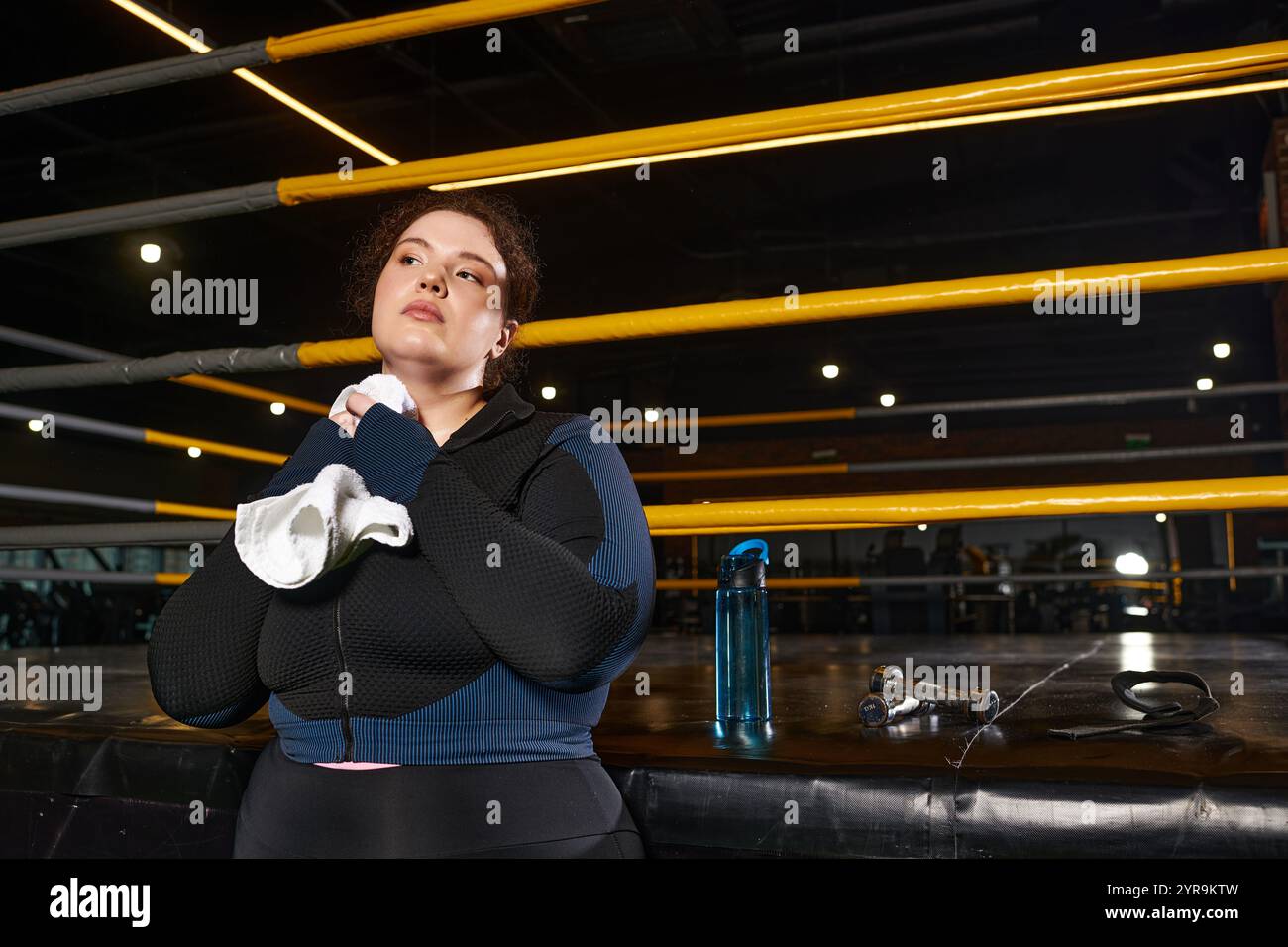 woman takes a breather, reflecting on their training journey in a ...