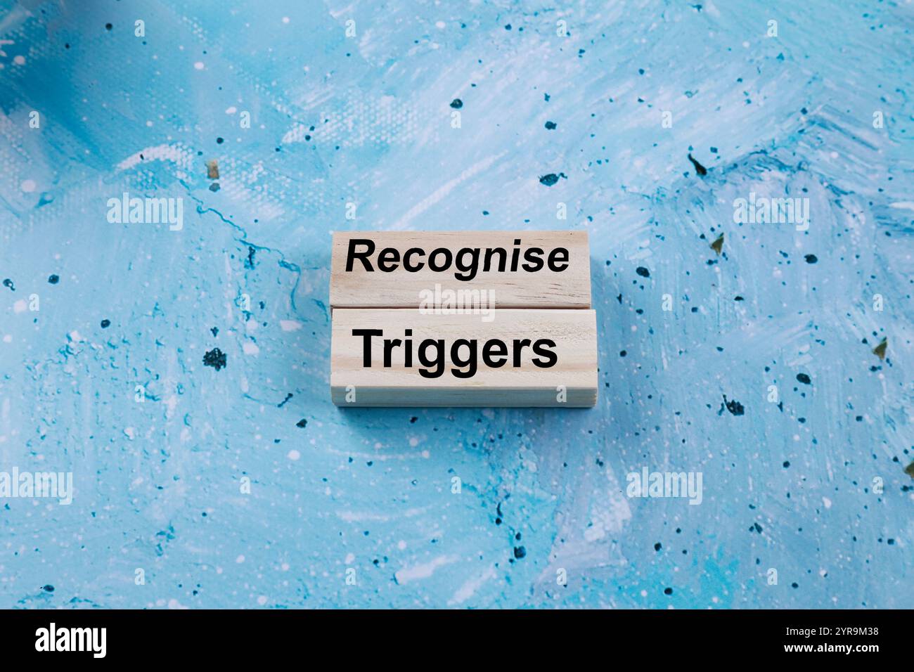 Triggers text on blue hi-res stock photography and images - Alamy