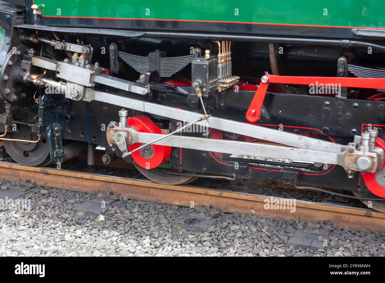 Close-up detail of the driving wheels and piston rods on Hunslet 2-4-0 ...