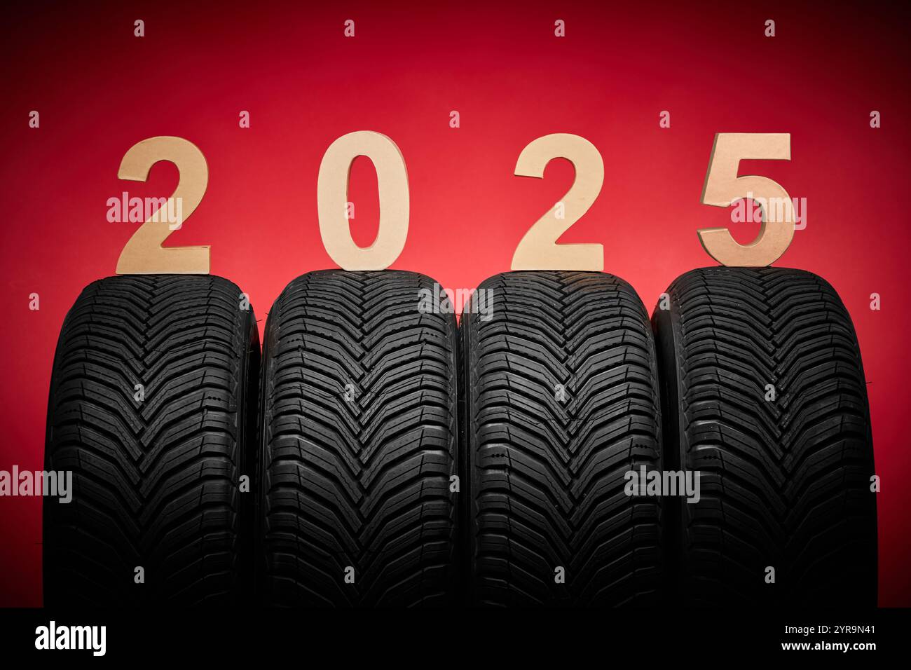 Car tires, winter wheels, isolated new tyres, happy new year 2025 on ...