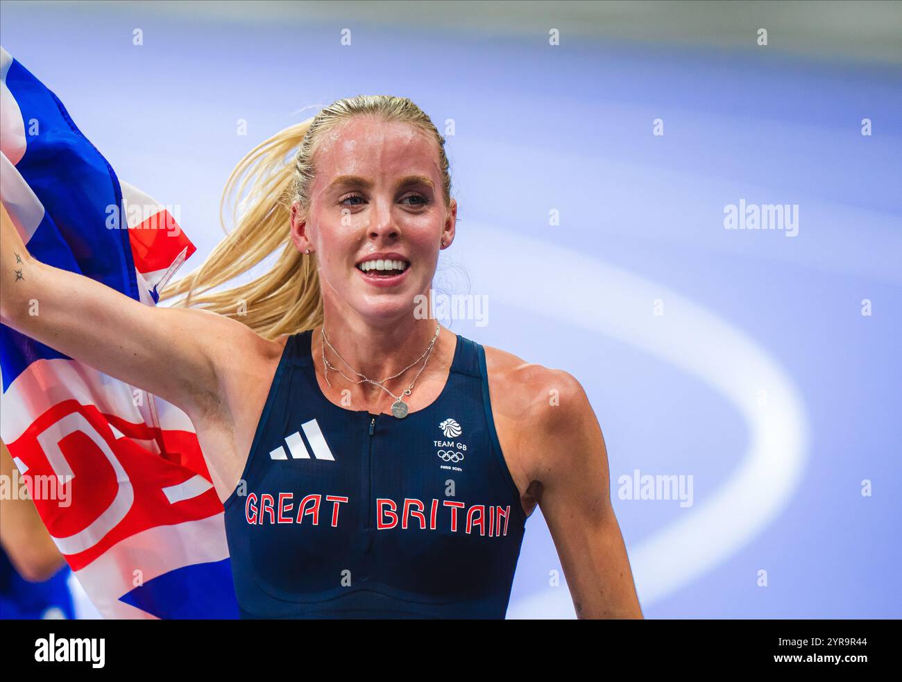 Keely Hodgkinson celebrating with her country's flag in the at the ...