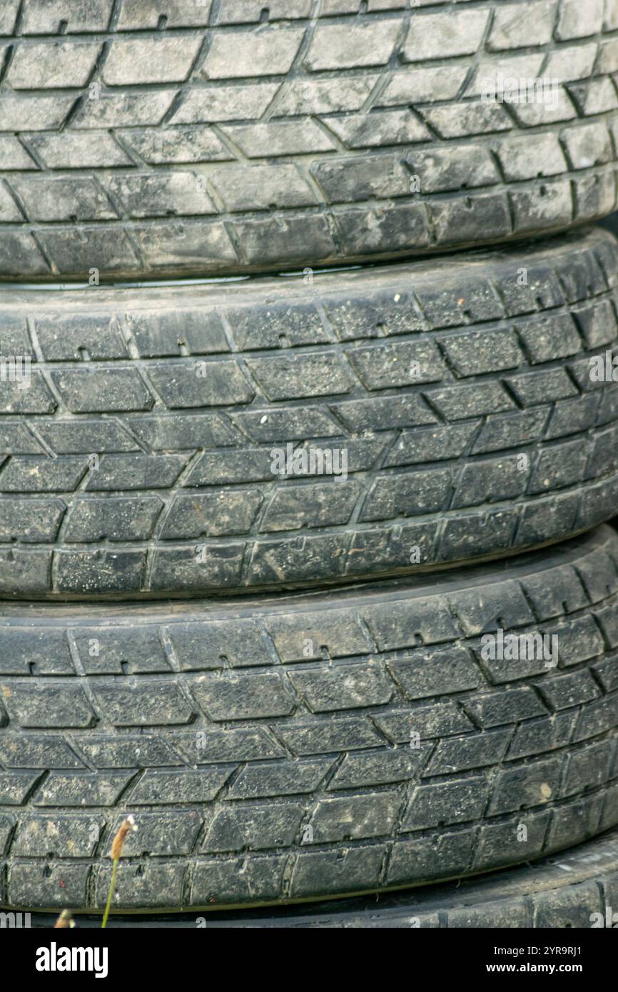 pile of worn racing car tires, textured background Stock Photo - Alamy
