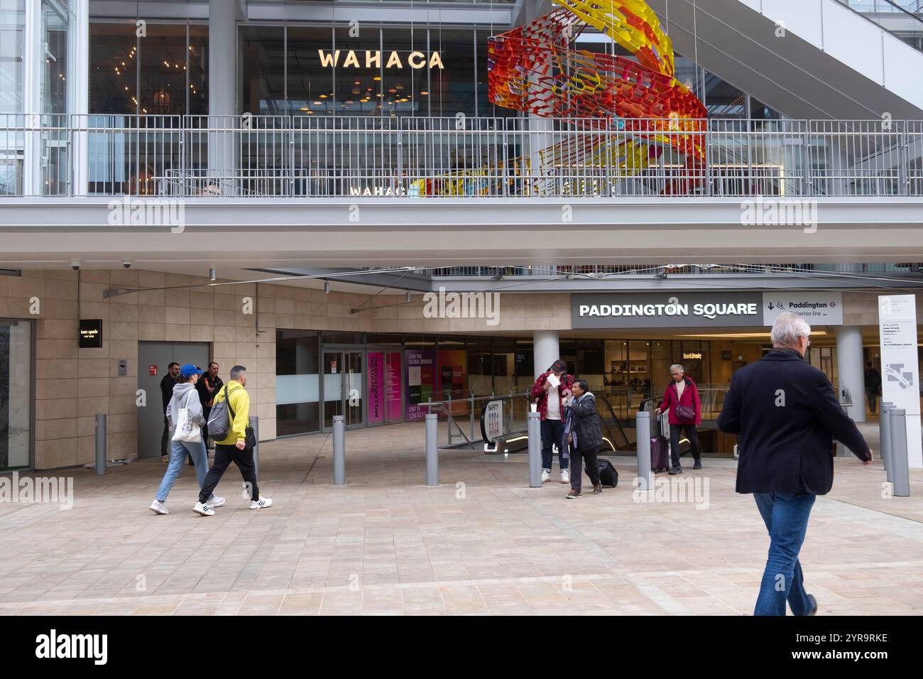 People walking outside Wahaca restaurant at new addington Square area ...