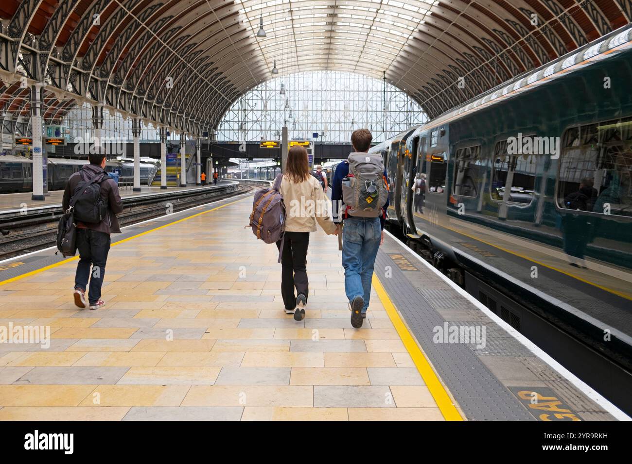 Couple getting on train uk hi-res stock photography and images - Alamy