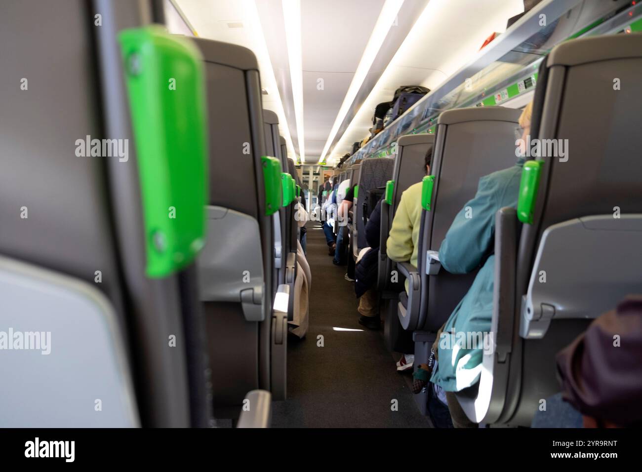 View of aisle seats and passengers sitting on Great Western GWR train ...
