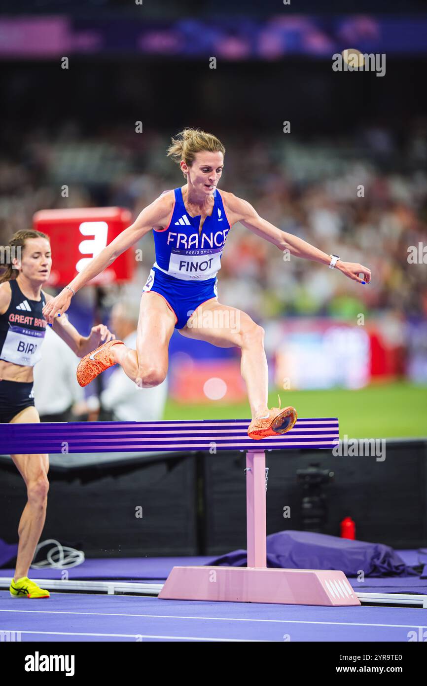 Alice Finot participating in the 3000 metres steeplechase at the Paris ...