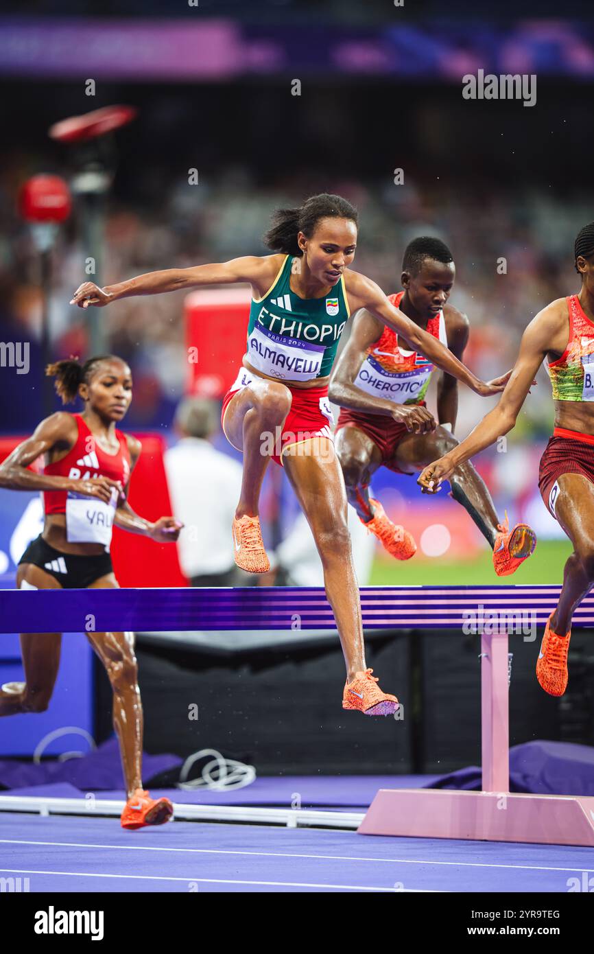 Sembo Almayew participating in the 3000 metres steeplechase at the ...
