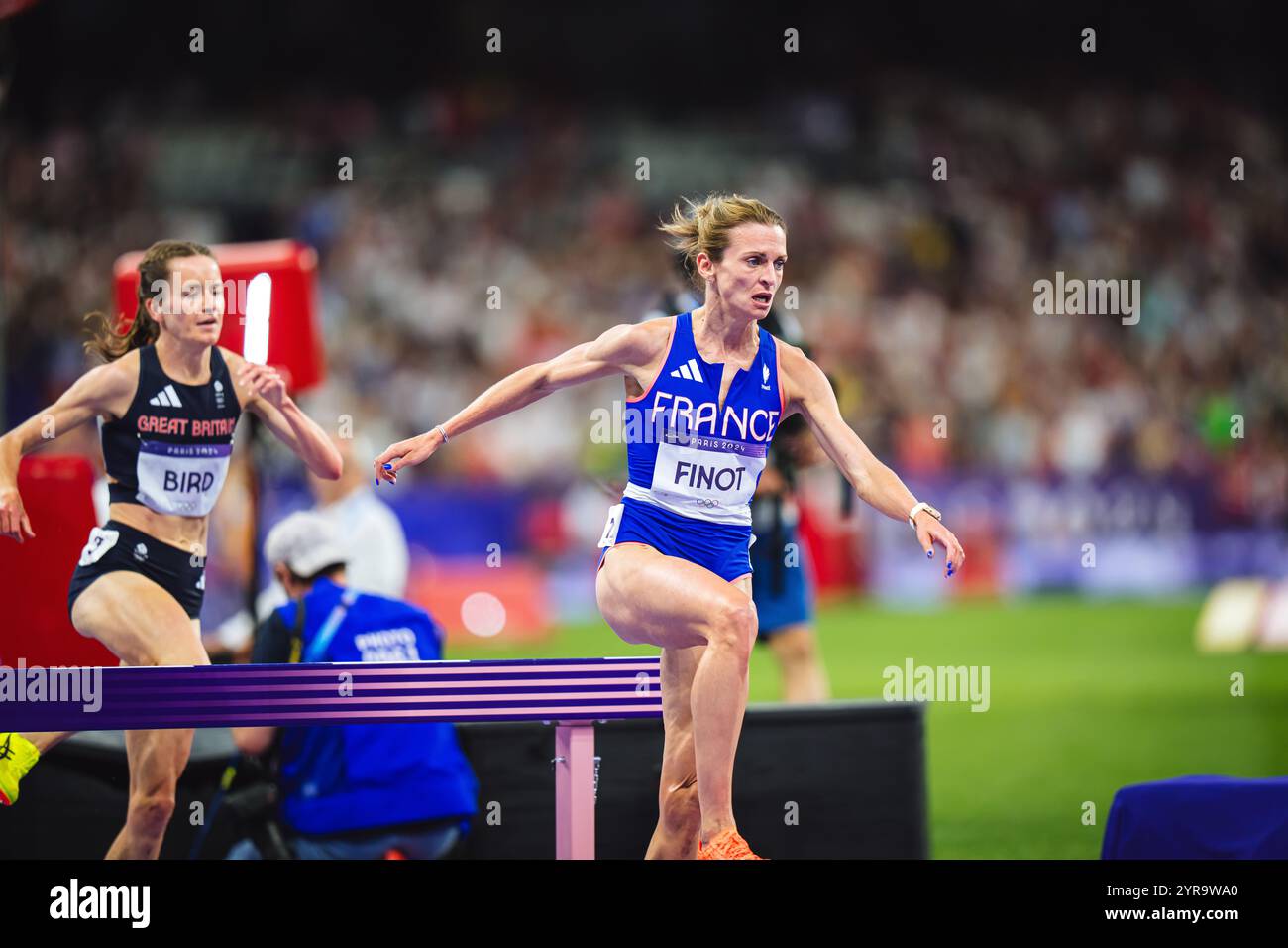 Alice Finot participating in the 3000 metres steeplechase at the Paris ...