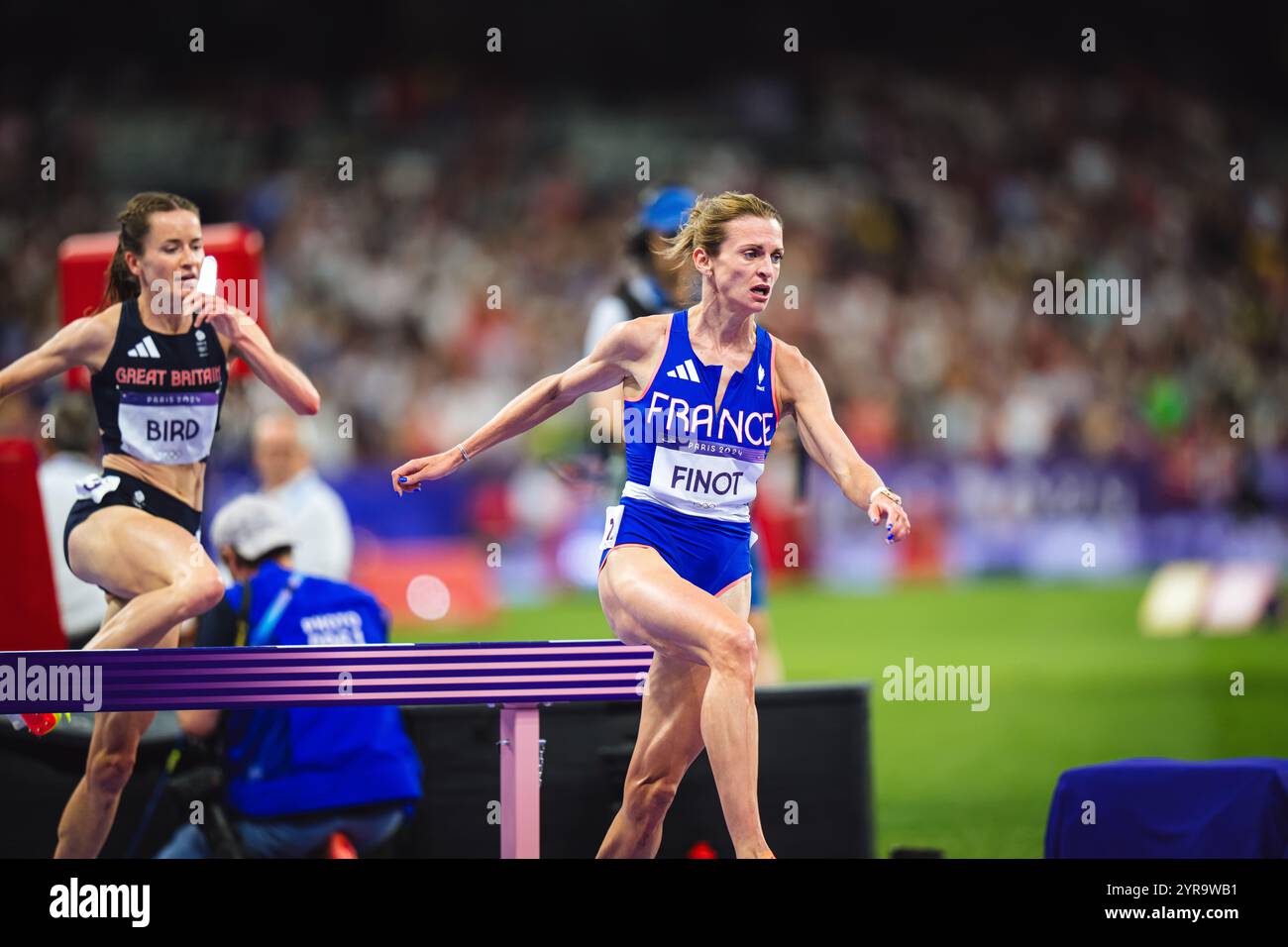 Alice Finot participating in the 3000 metres steeplechase at the Paris ...