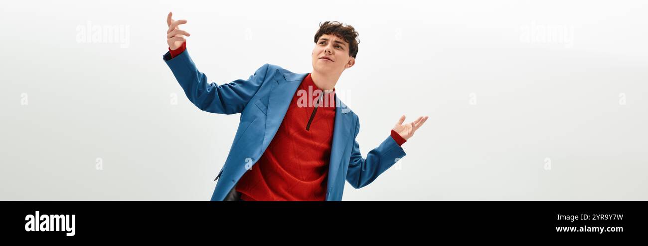 A handsome man confidently sports a stylish outfit in a sleek ...