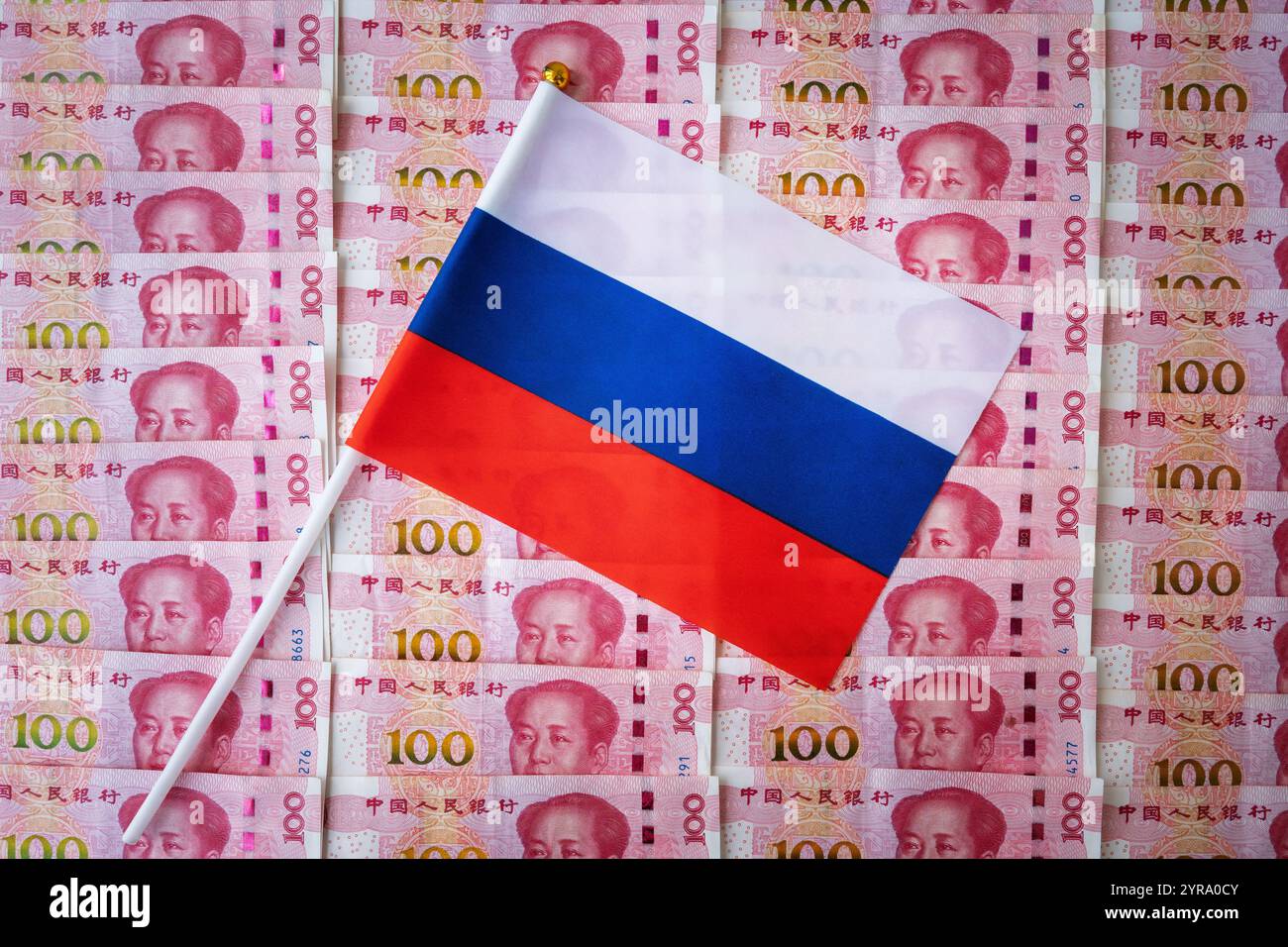 the Russian flag and Chinese yuan. The monetary turnover of the yuan in ...