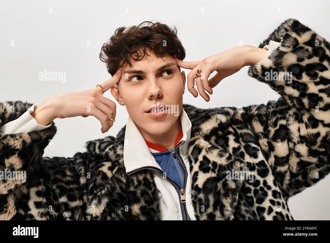 Handsome man showcases his fashion sense and charisma against a ...