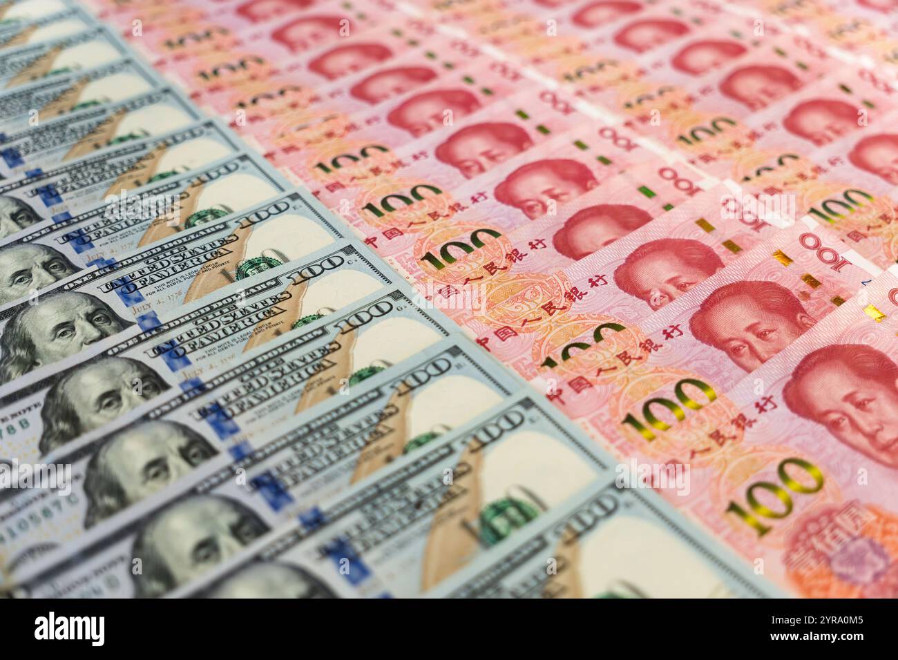 Chinese currency yuan and U.S. dollars amerkinaische bills. The concept ...