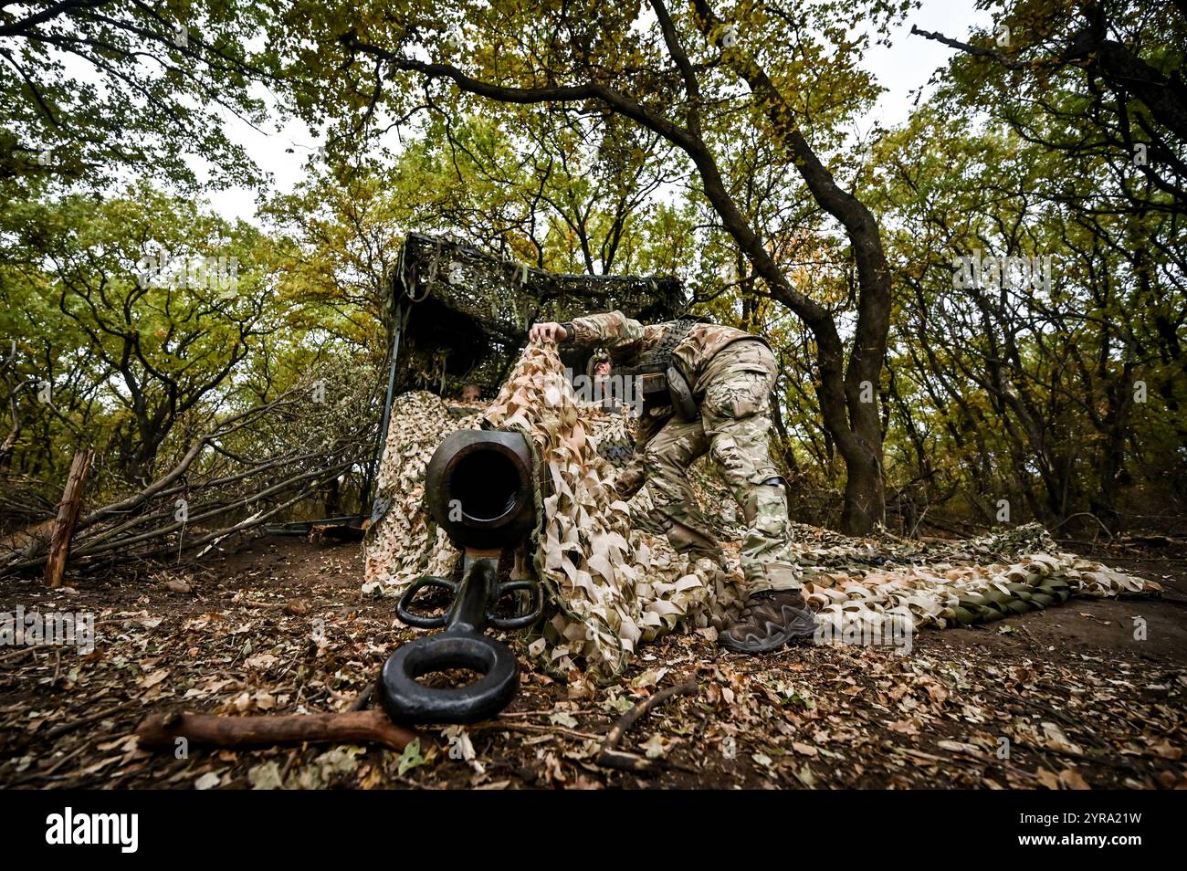 DONETSK REGION, UKRAINE - OCTOBER 25, 2024 - An artilleryman of the ...