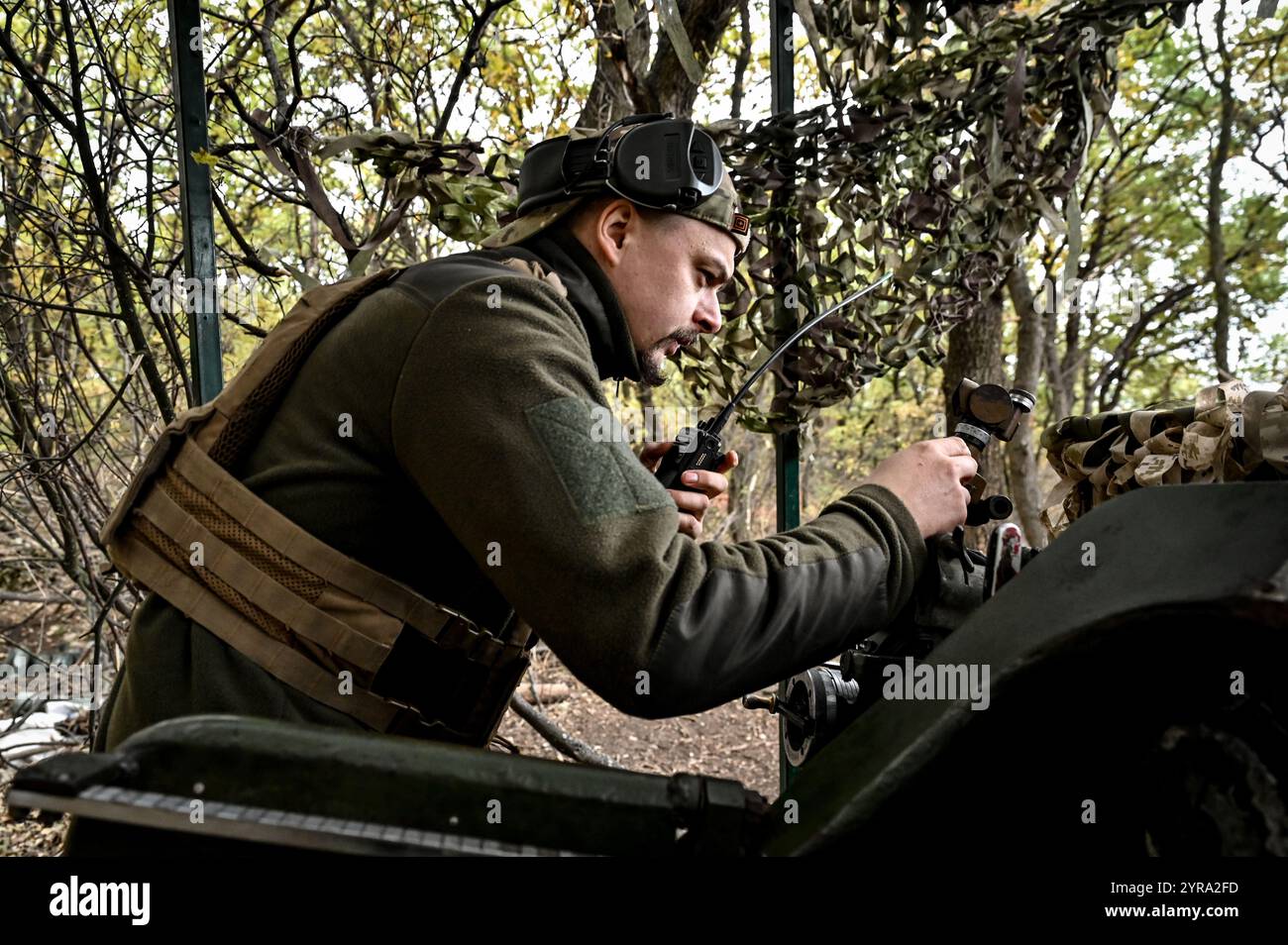 DONETSK REGION, UKRAINE - OCTOBER 25, 2024 - An artilleryman of the ...